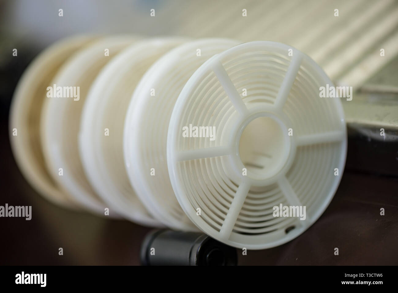 details of analog film laboratory equipment on the table. film rolls ...