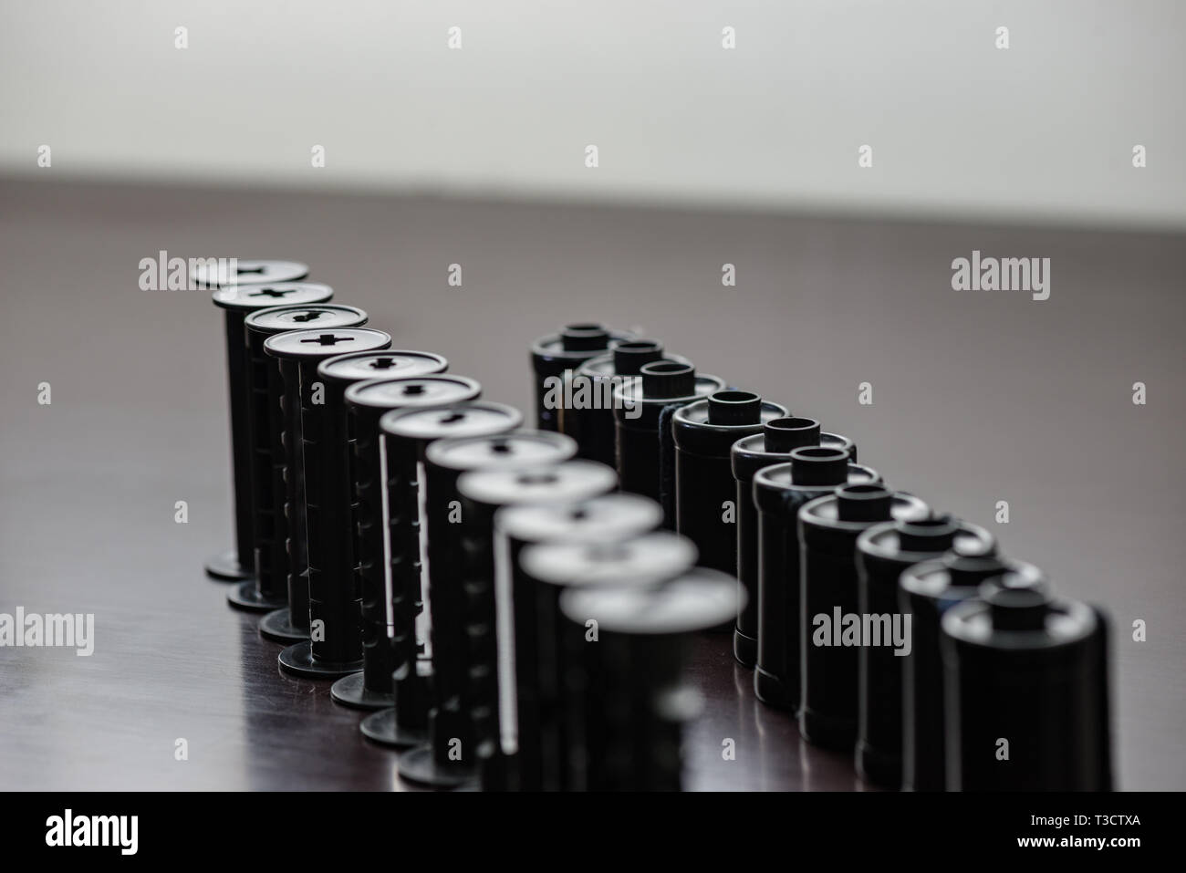 details of analog film laboratory equipment on the table. film rolls ...