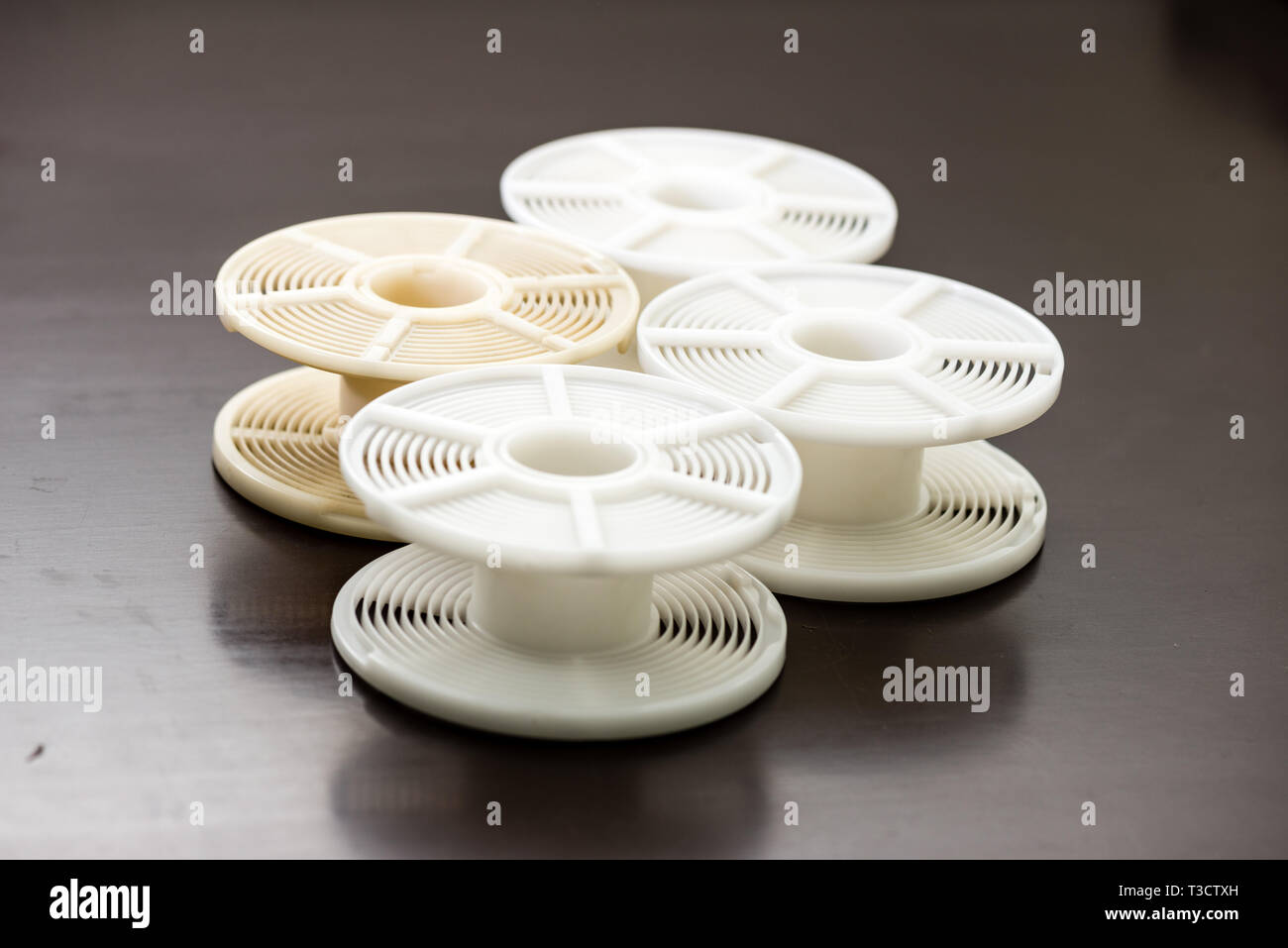 details of analog film laboratory equipment on the table. film rolls ...