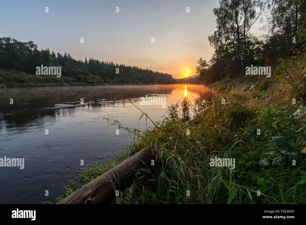 colorful sunset on the river on summer night Stock Photo - Alamy