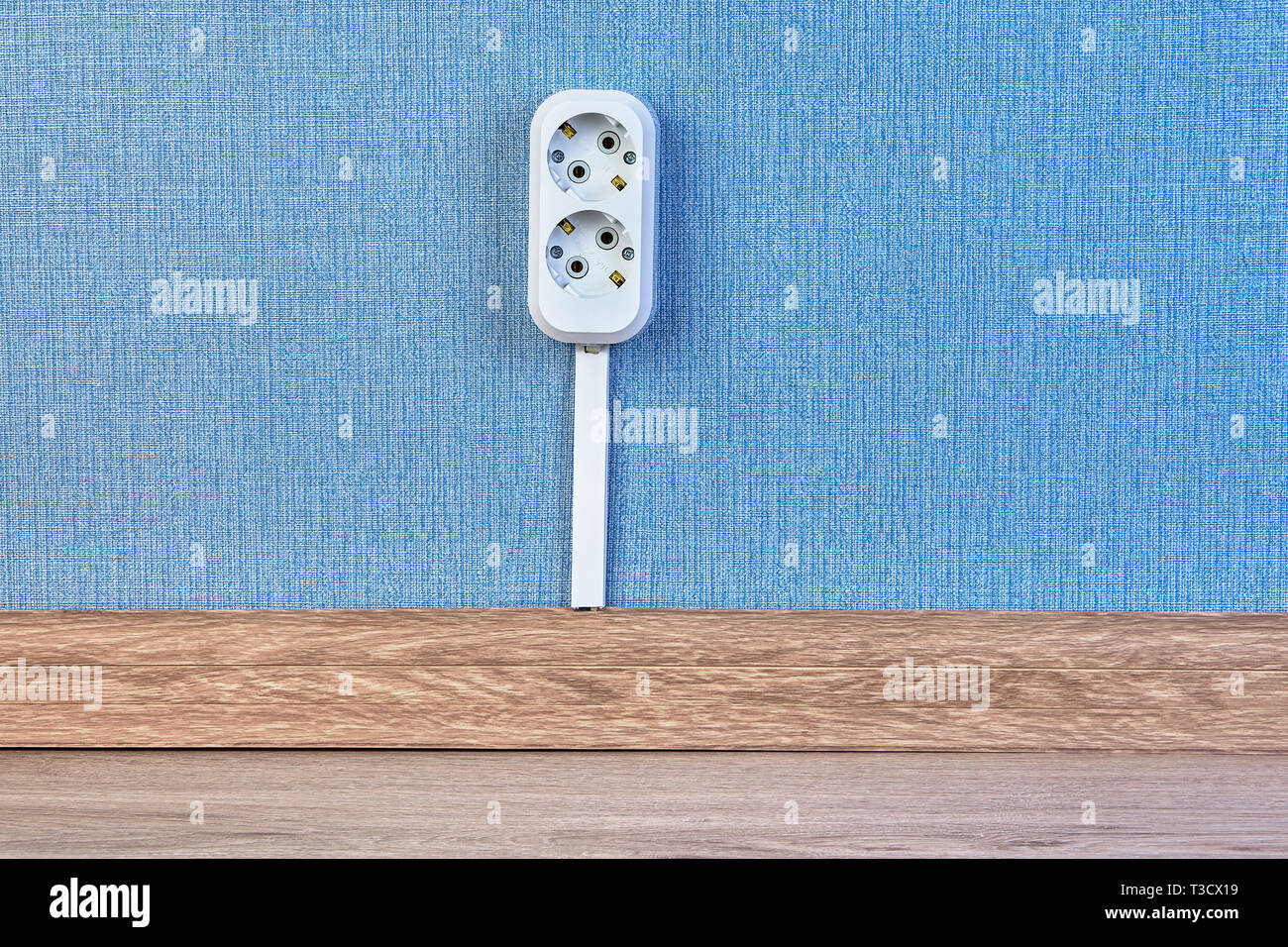 New electrical outlet socket connected with frool with help of cable ...