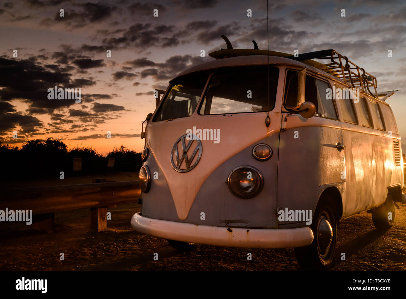 Vintage Volkswagon VW Microbus with rooftop rack for surfboards, parked ...