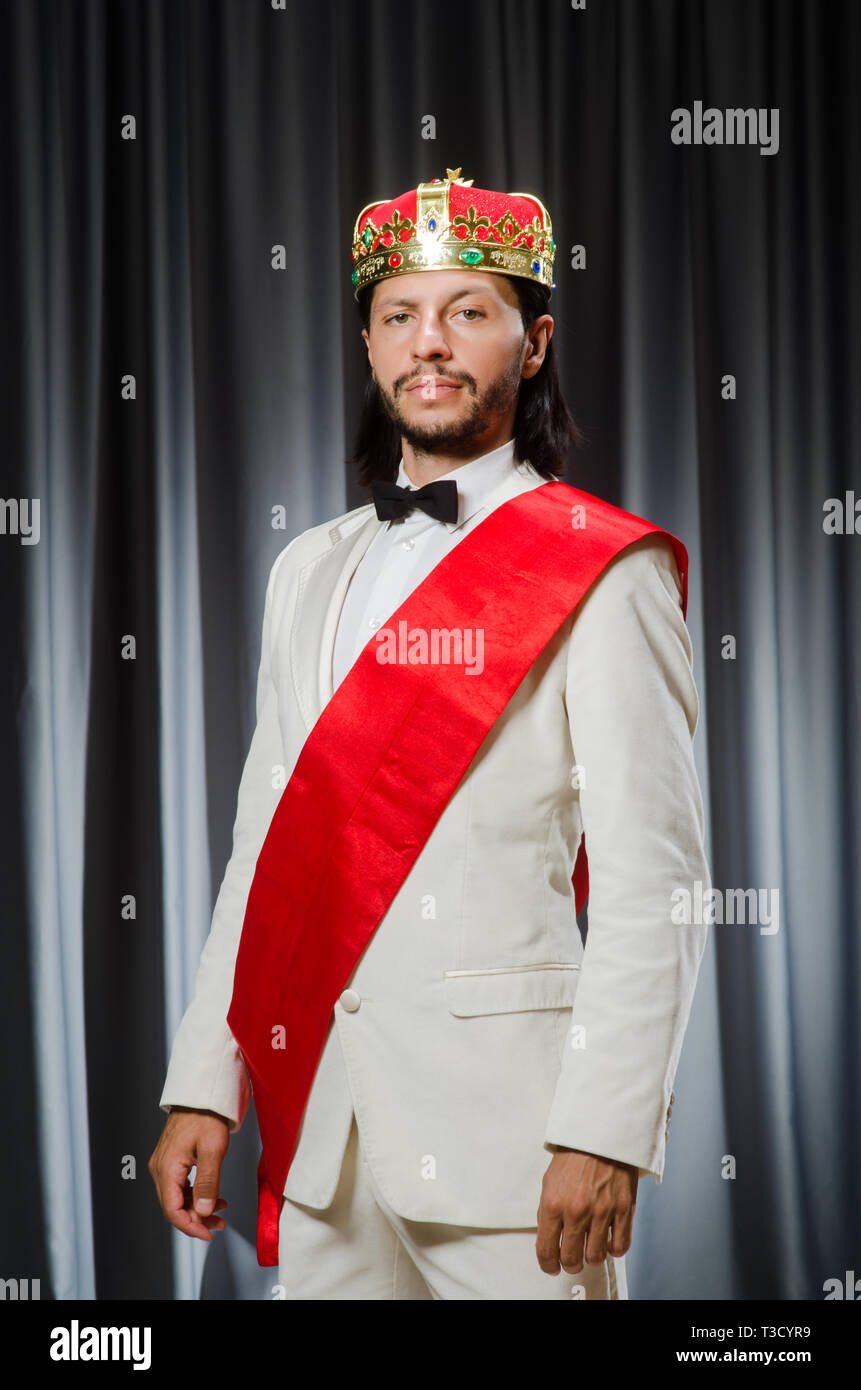 Funny king wearing crown in coronation concept Stock Photo - Alamy