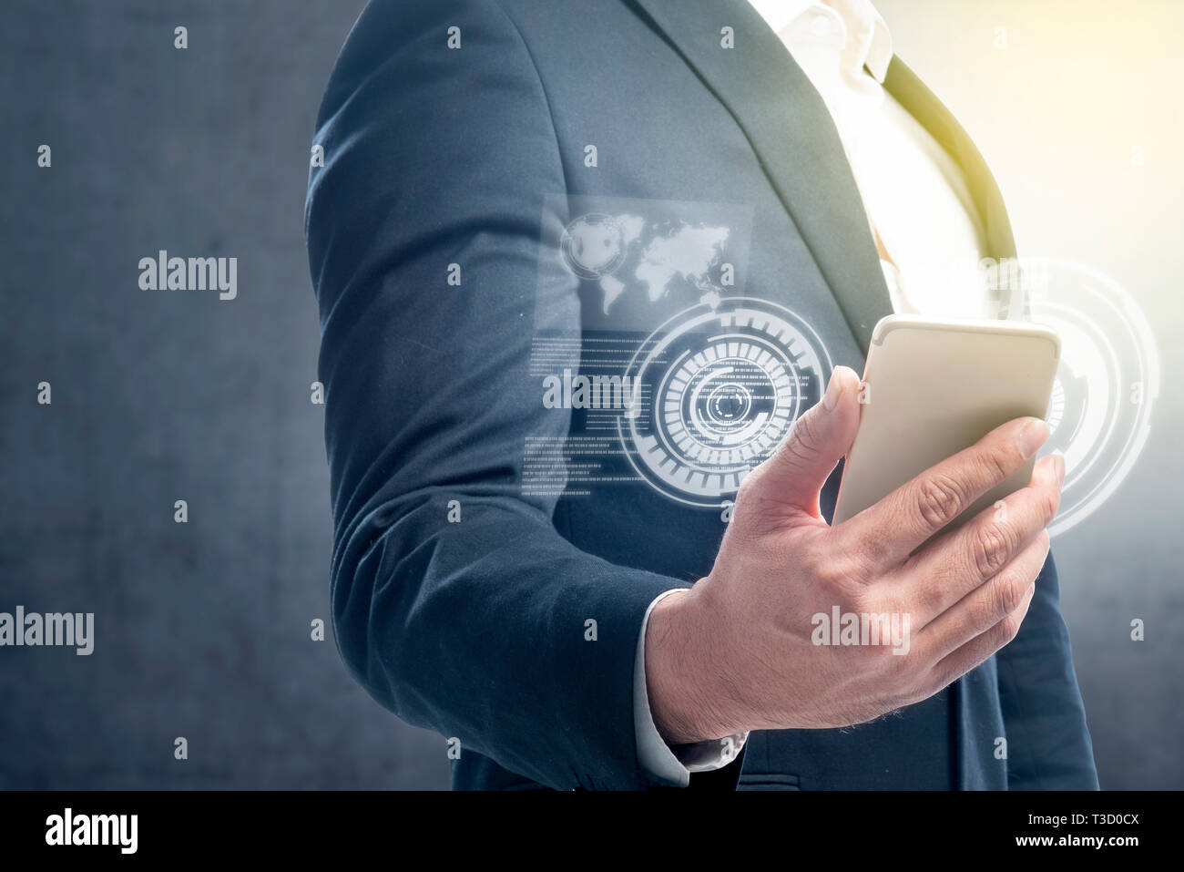 Businessman looking at the mobile phone virtual screen and display the ...