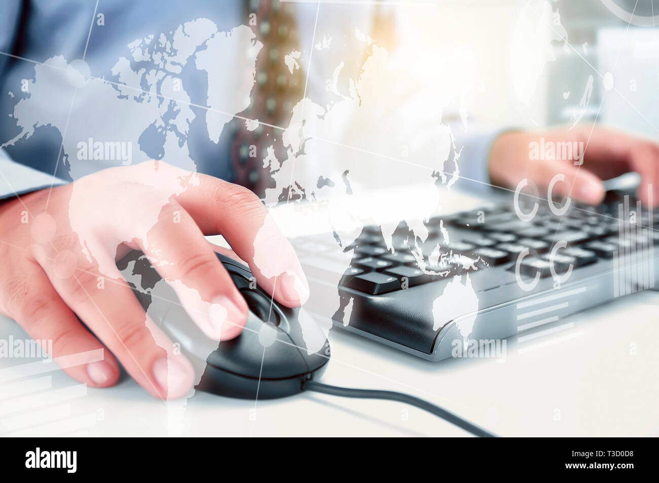 Businessman working with keyboard and mouse on the desk with display ...