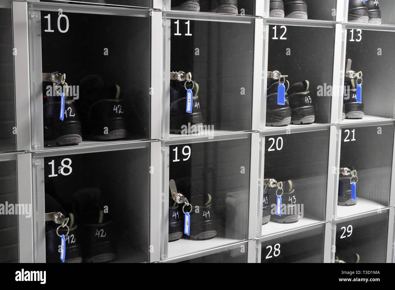 shoes in lockers Stock Photo - Alamy