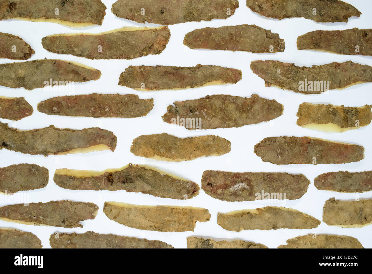 Abstract composition of potatoes peels, leftovers on white background ...
