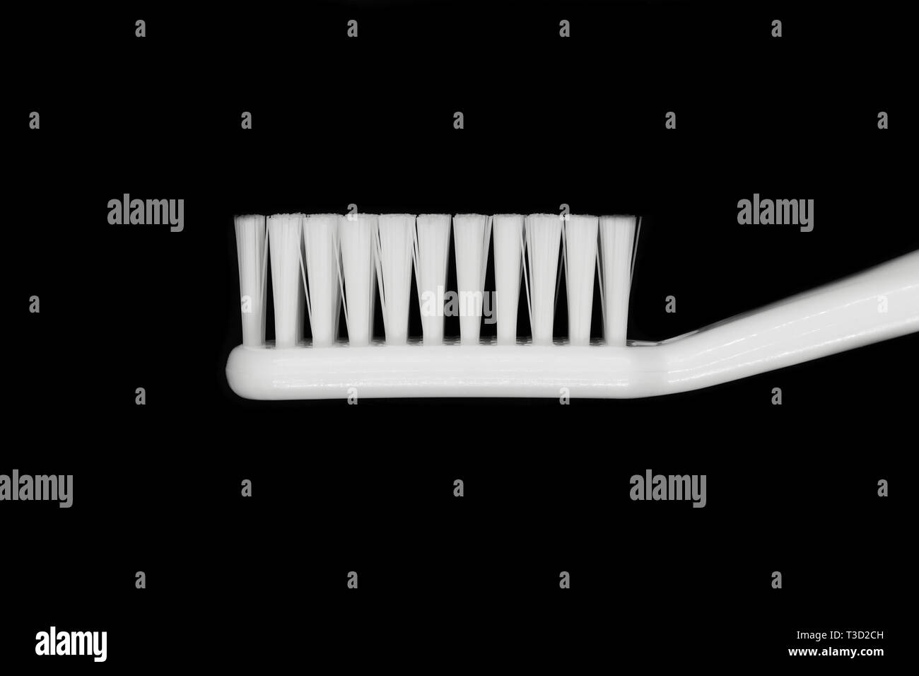 Side view of white toothbrush isolated on black background Stock Photo ...