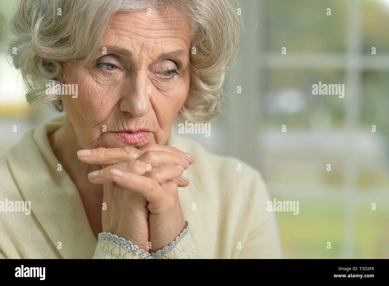 portrait of sad senior woman Stock Photo - Alamy