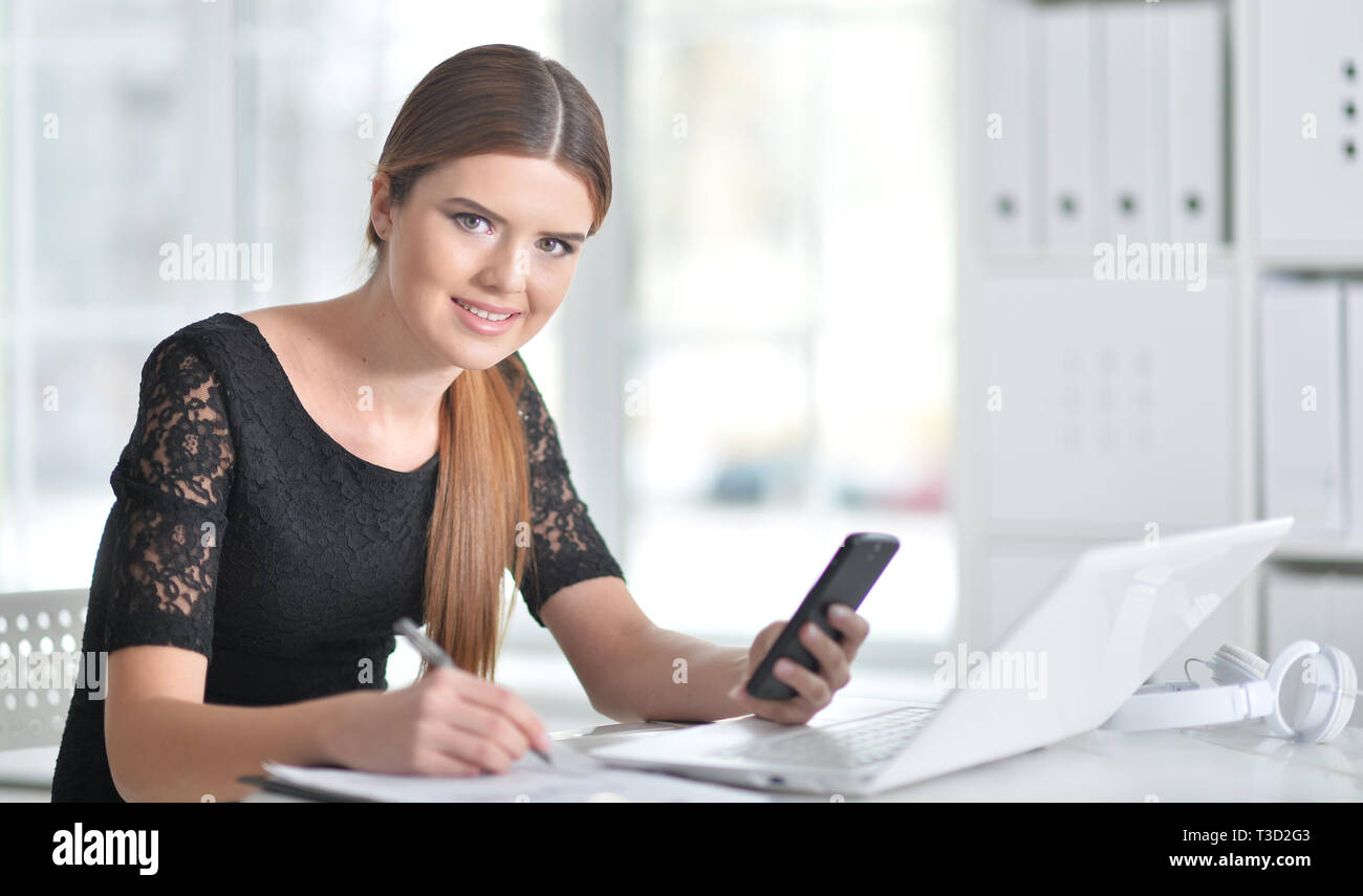 Young attractive woman working Stock Photo - Alamy