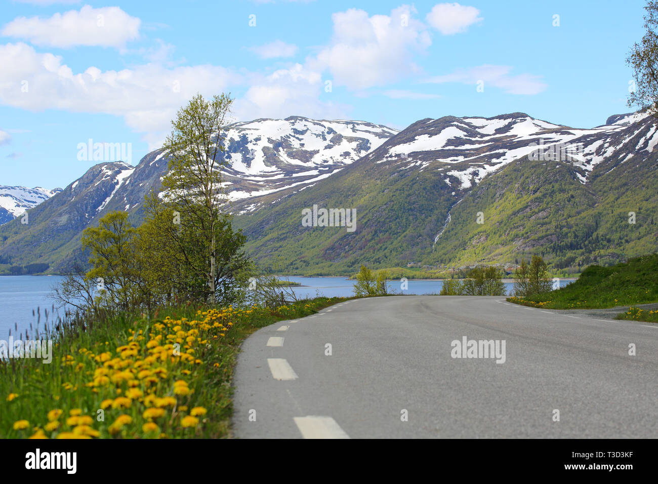 Picturesque spring Norway landscape with asphalt road in mountains near ...