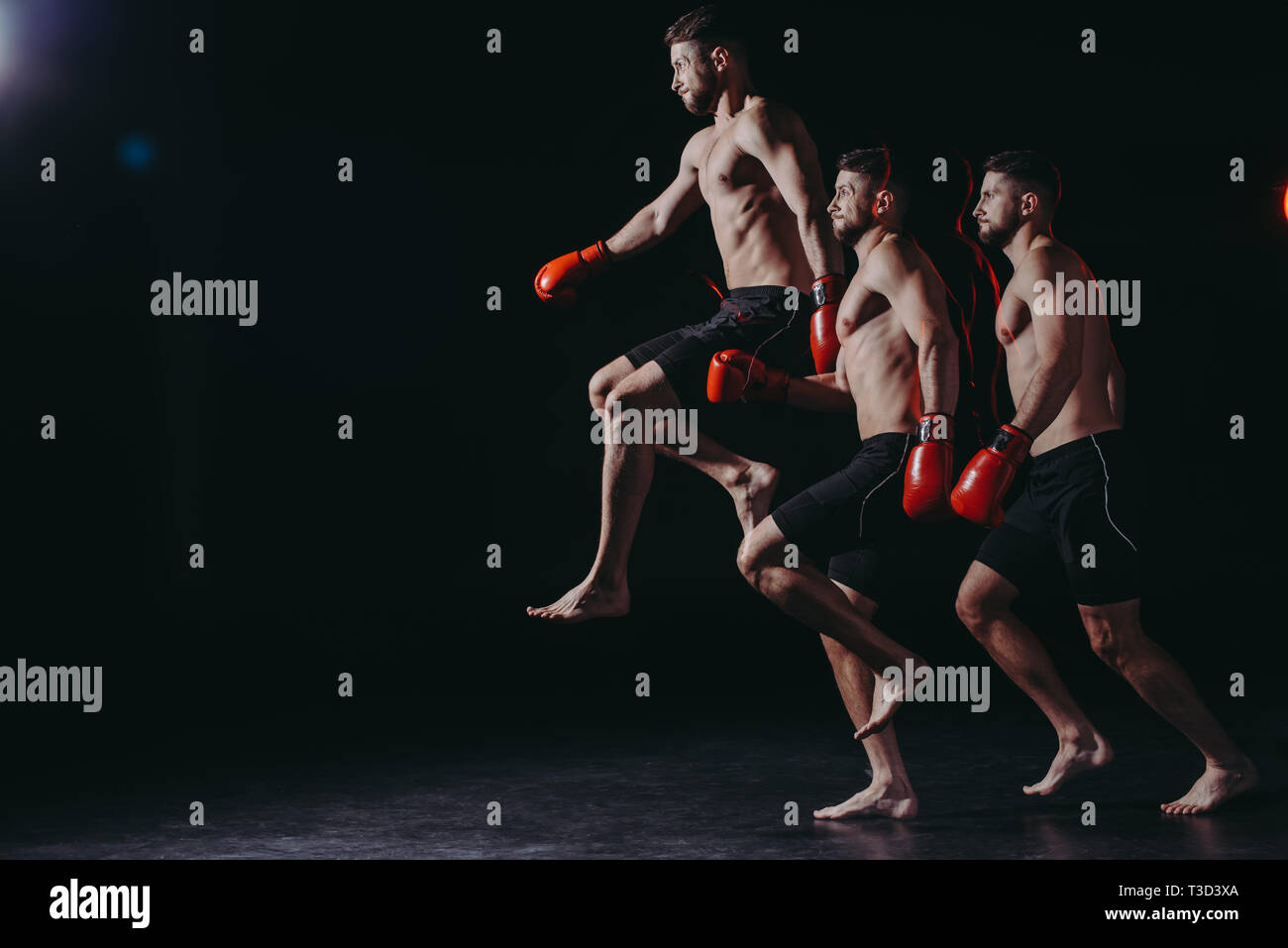 multiple exposure of strong shirtless muscular boxer in boxing gloves ...