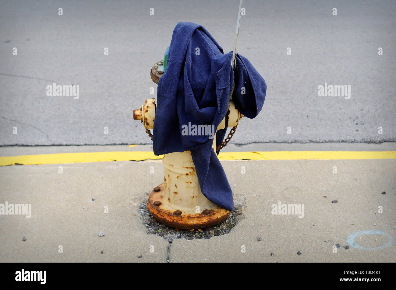 A fire hydrant covered with cloth on a city street Stock Photo - Alamy