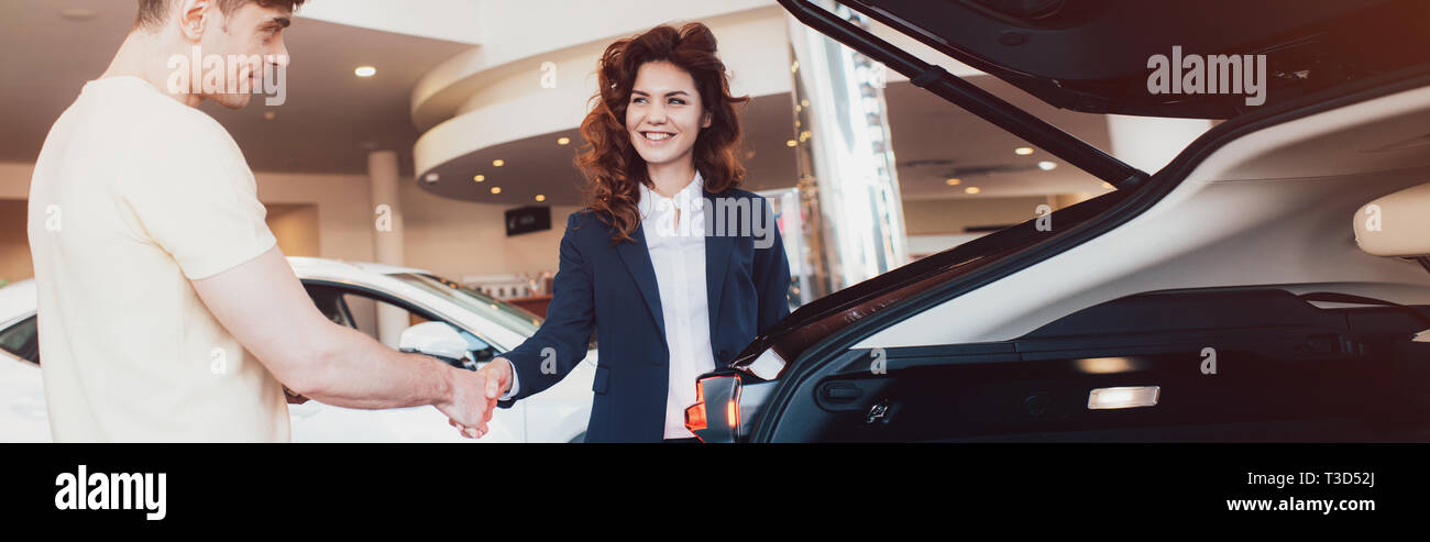 Two hands shaking car in hi-res stock photography and images - Alamy