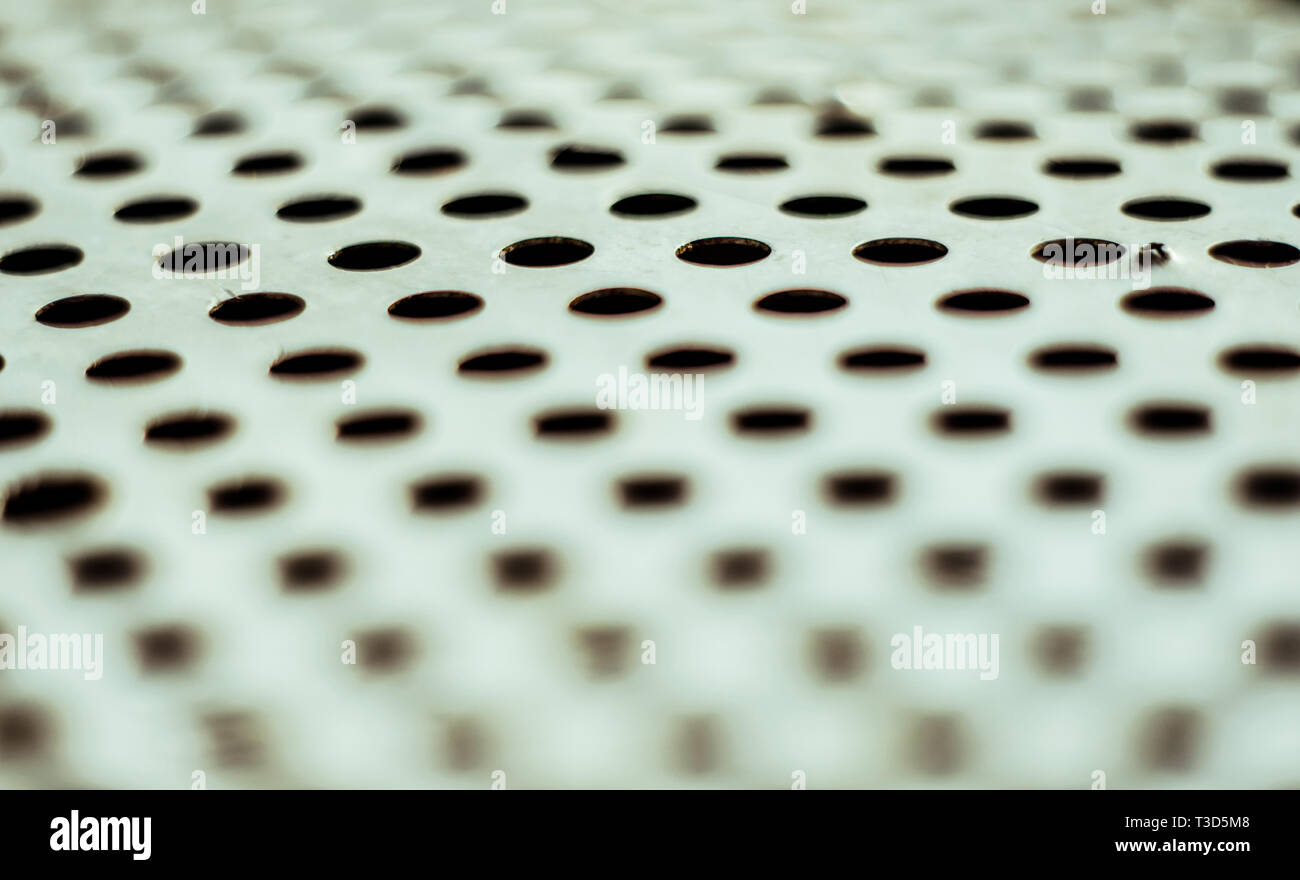 Perforated aluminium sheet of metal texture. Old surface with depth of ...