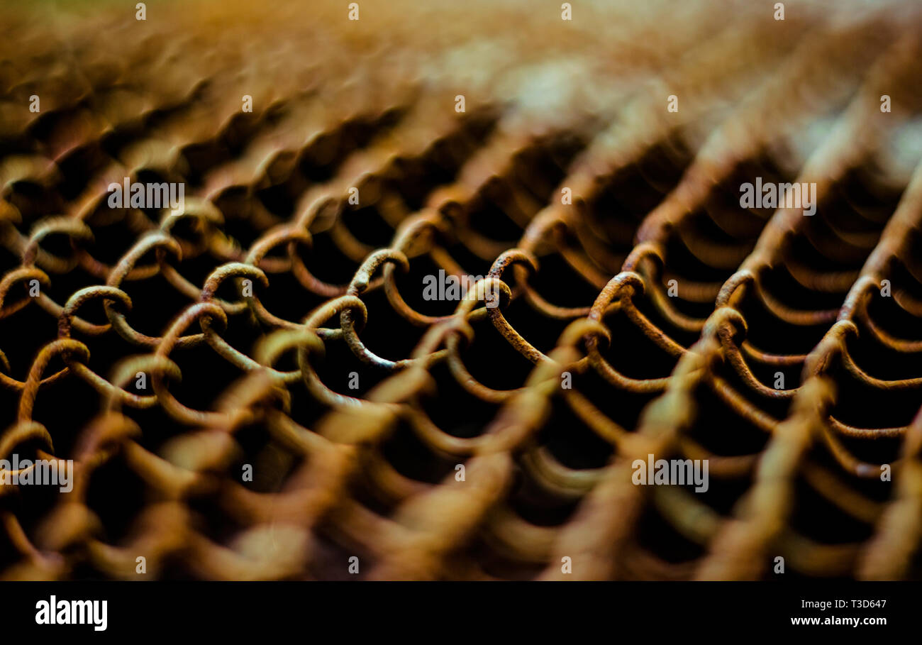 Rusty iron mesh weaving from wire. Surface with depth of field ...