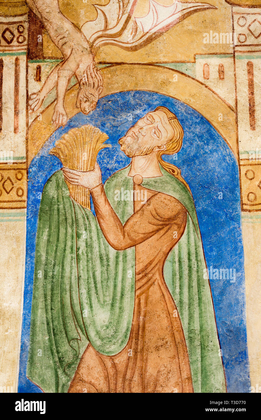 Cain holds up a sheaf to God Father and his sacrifice is refused by a ...