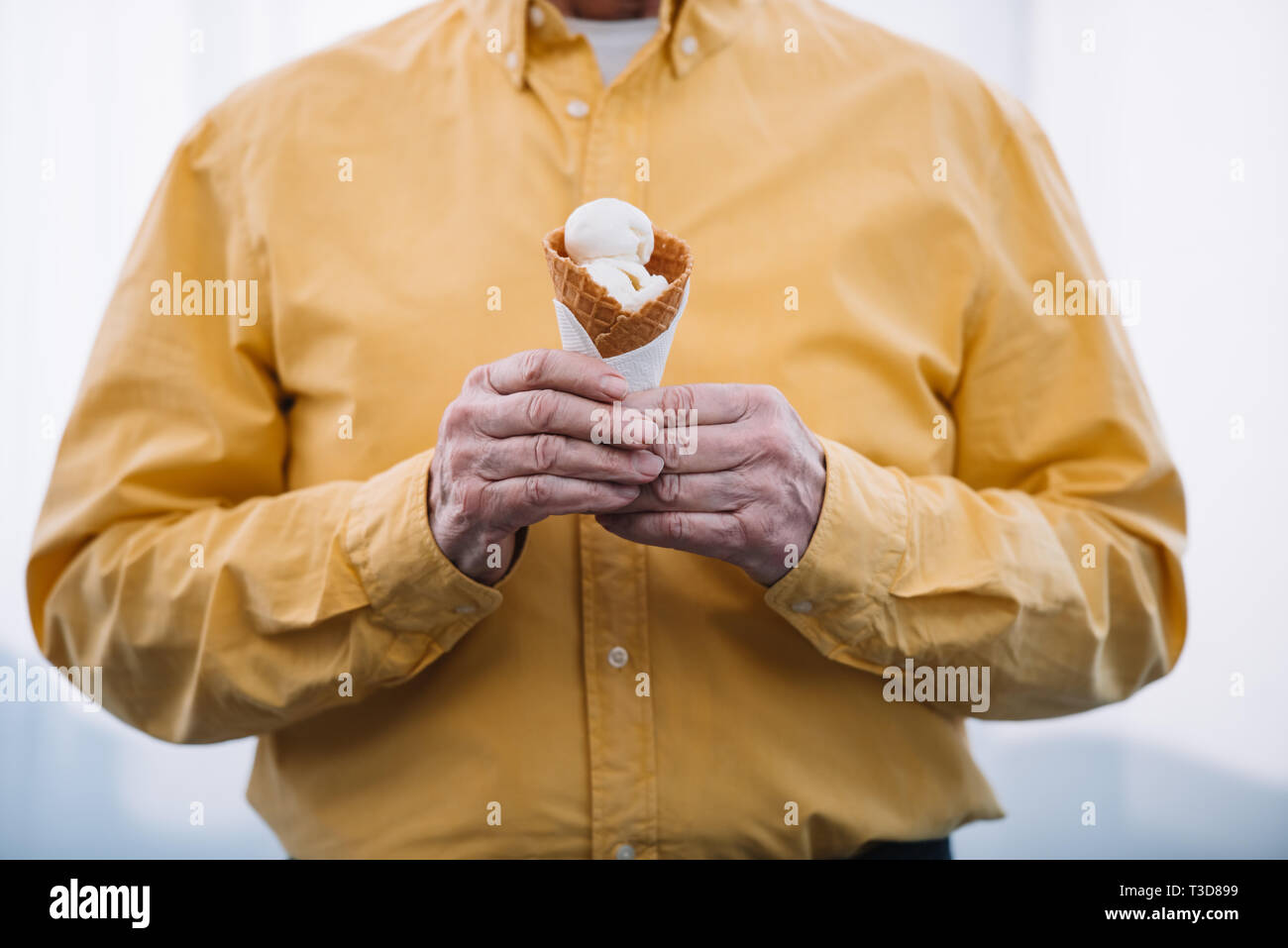 Man with ice cream cone hi-res stock photography and images - Alamy