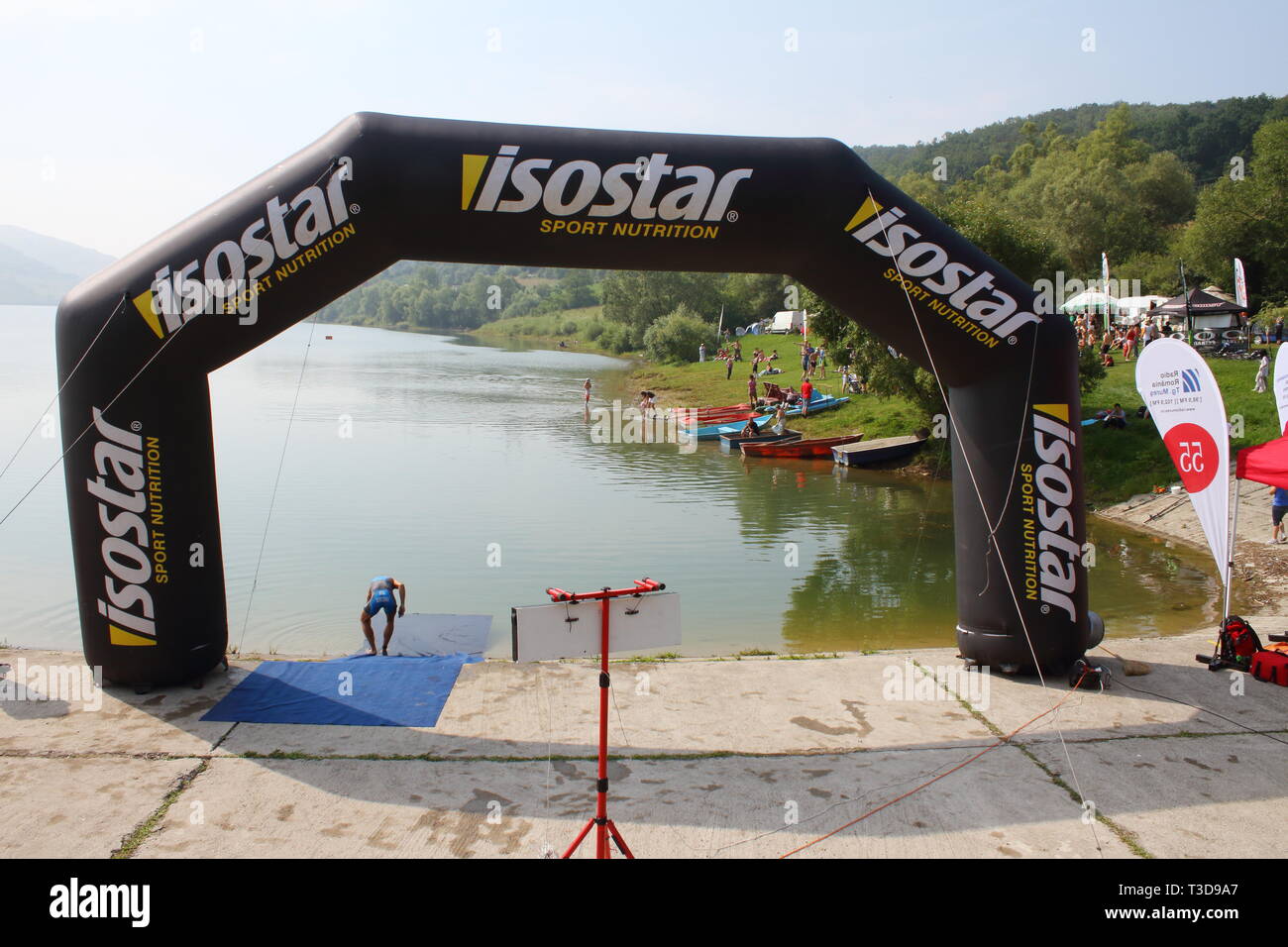 Swimmers' arrival gate at triathlon competition at Lake Bezid, near ...