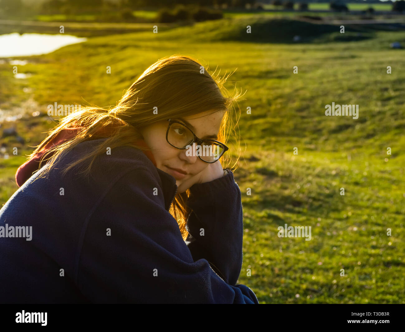 Woman taking a sunbath hi-res stock photography and images - Alamy
