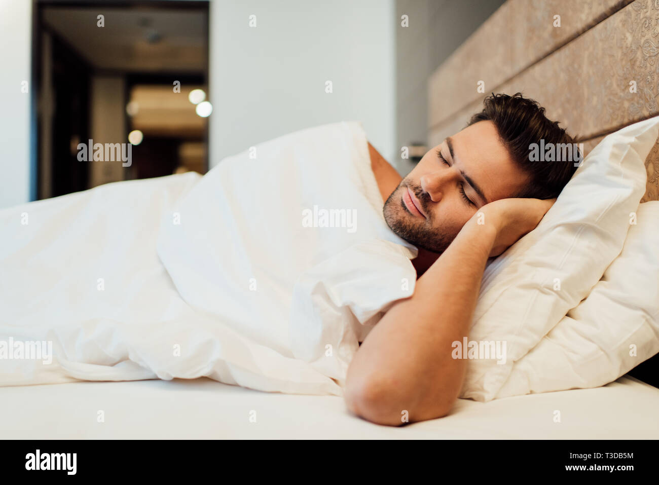 selective focus of handsome bearded man sleeping in bed Stock Photo - Alamy