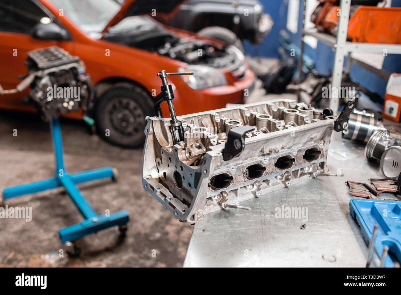 Selective focus. Engine Block on a repair stand with Piston and ...