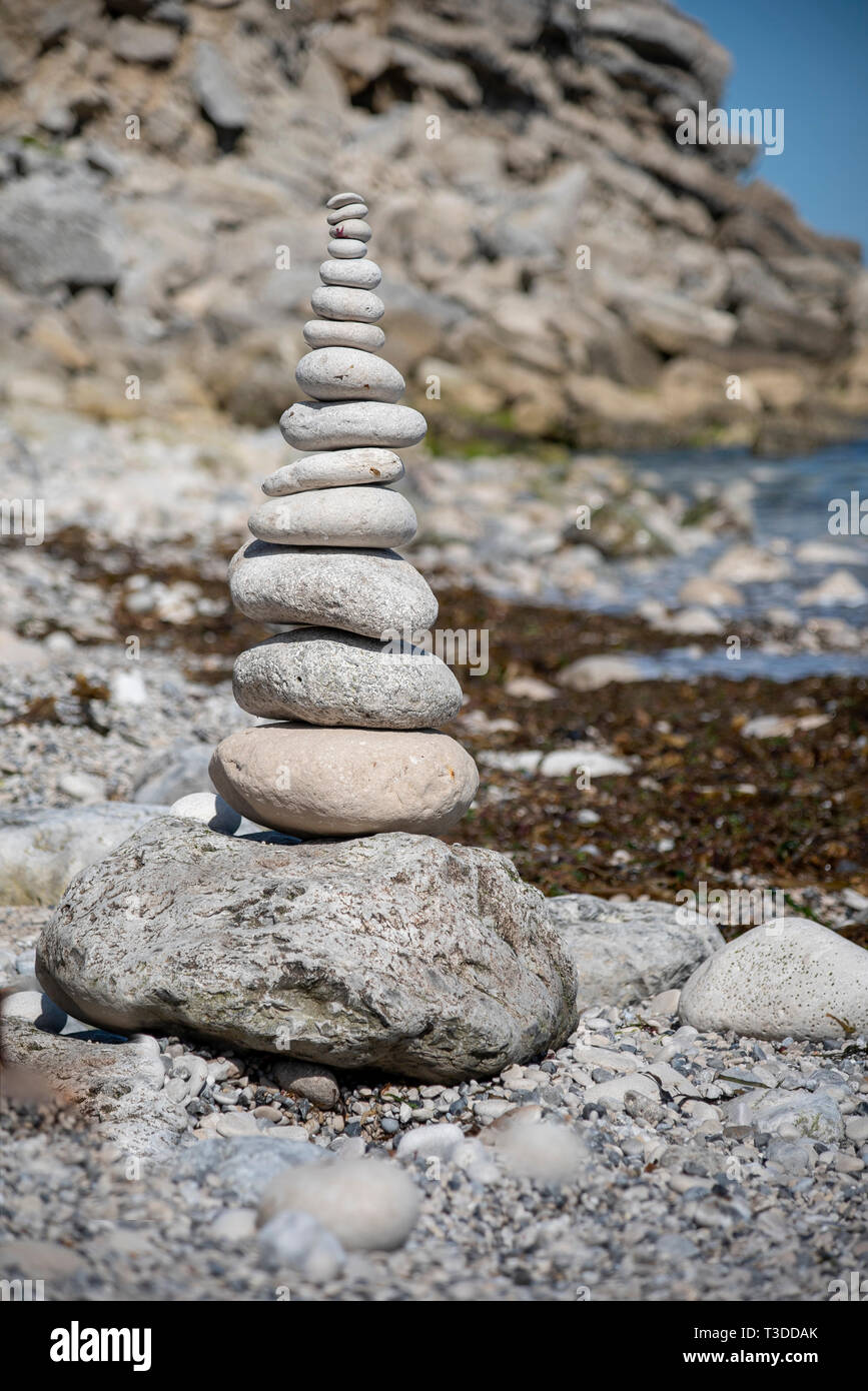 Balancing Pebble Tower on the beach Stock Photo - Alamy