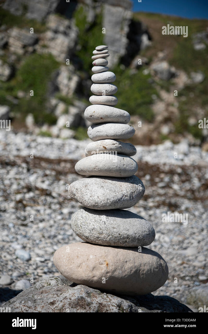 Balancing Pebble Tower on the beach Stock Photo - Alamy