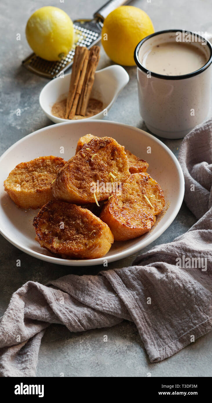 Traditional homemade Spanish torrijas grey stone background. copyspace ...