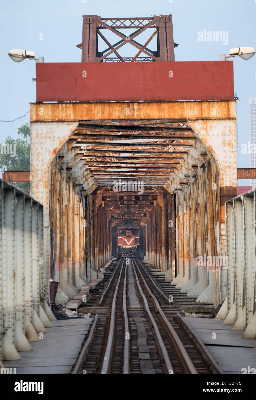 Train running on ancient railway on Long Bien bridge in Hanoi, Vietnam ...