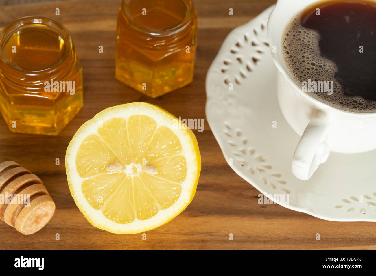 tea, lemon and honey on a wooden countertop, natural and healthy Stock ...