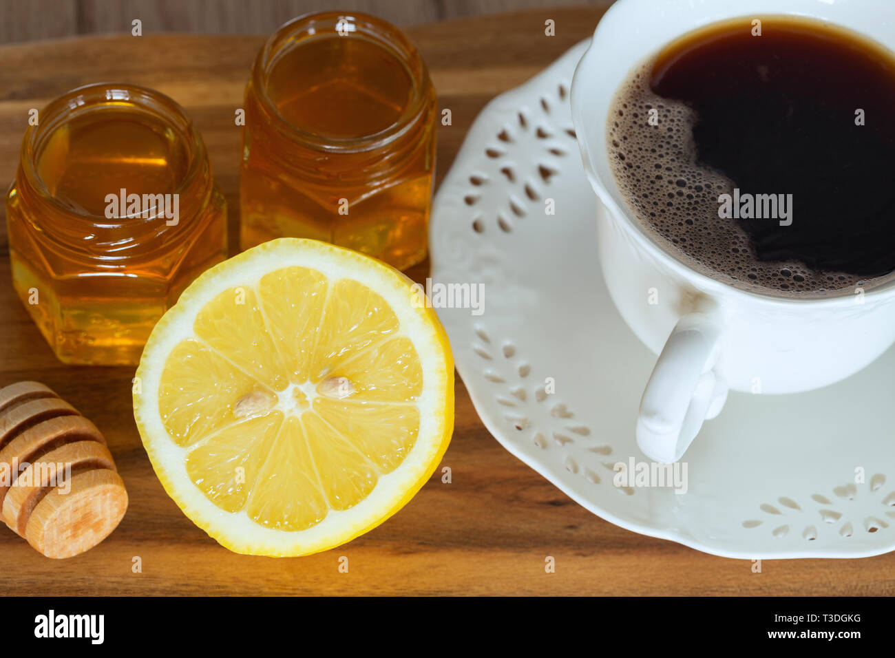 tea, lemon and honey on a wooden countertop, natural and healthy Stock ...