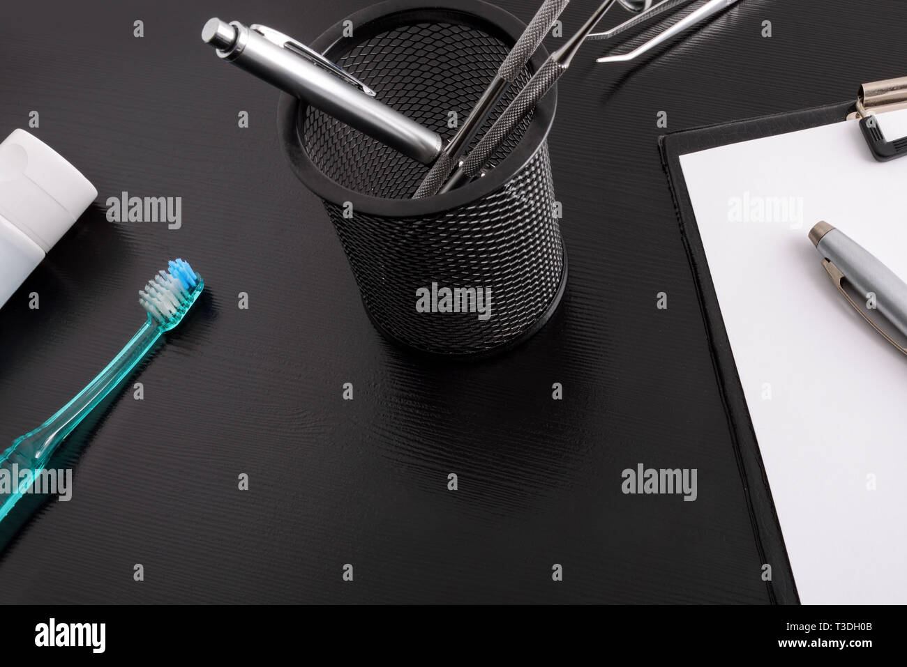 Black dentist table with tools. Elevated view. Horizontal composition ...