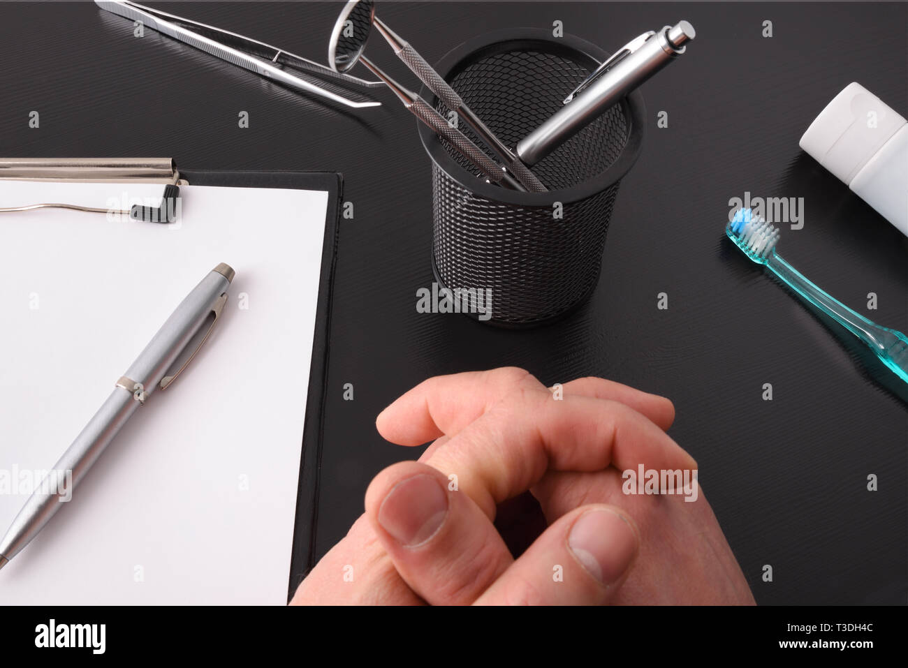 Top view of the table of a dentist doctor making a medical consultation ...