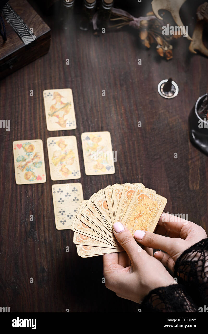 Divination cards. The fairy spreads the cards. The clairvoy arranges ...