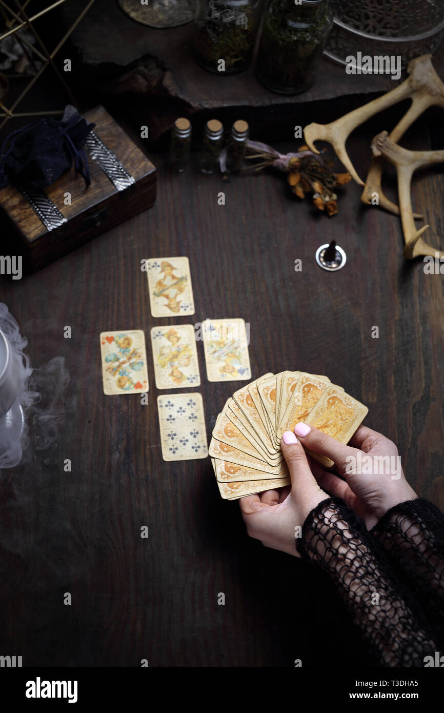 Solitaire and prediction. The fairy spreads the cards. The clairvoy ...