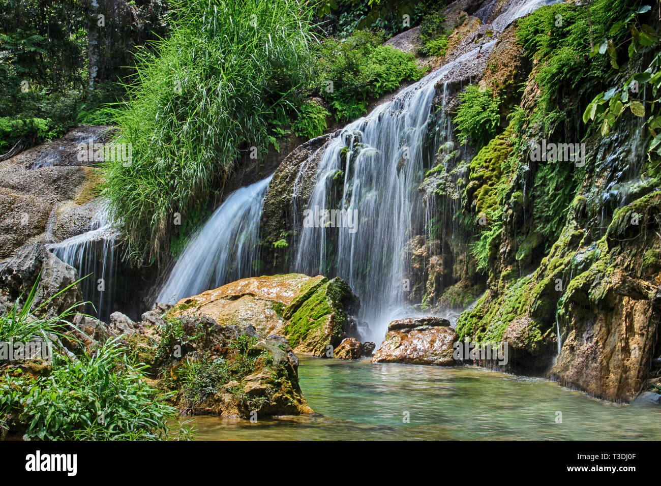 Waterfall El- Nicho in Cuba in the jungle natioanl park. It is situated in Zapata Peninsula ...
