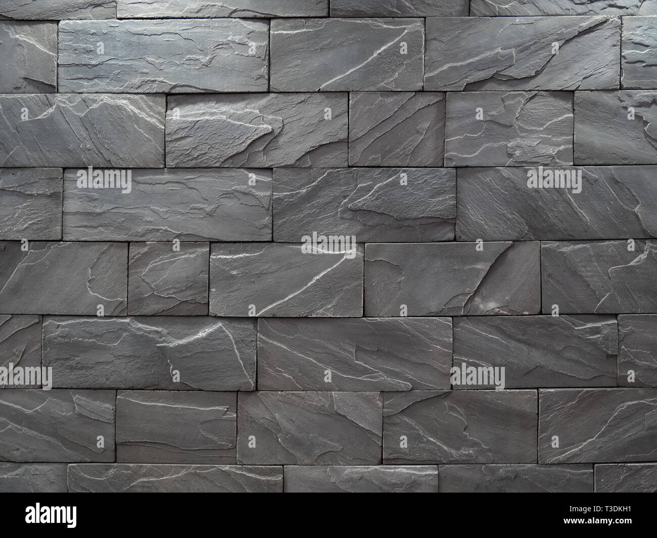 black rough and solid stone block wall pattern for background Stock ...