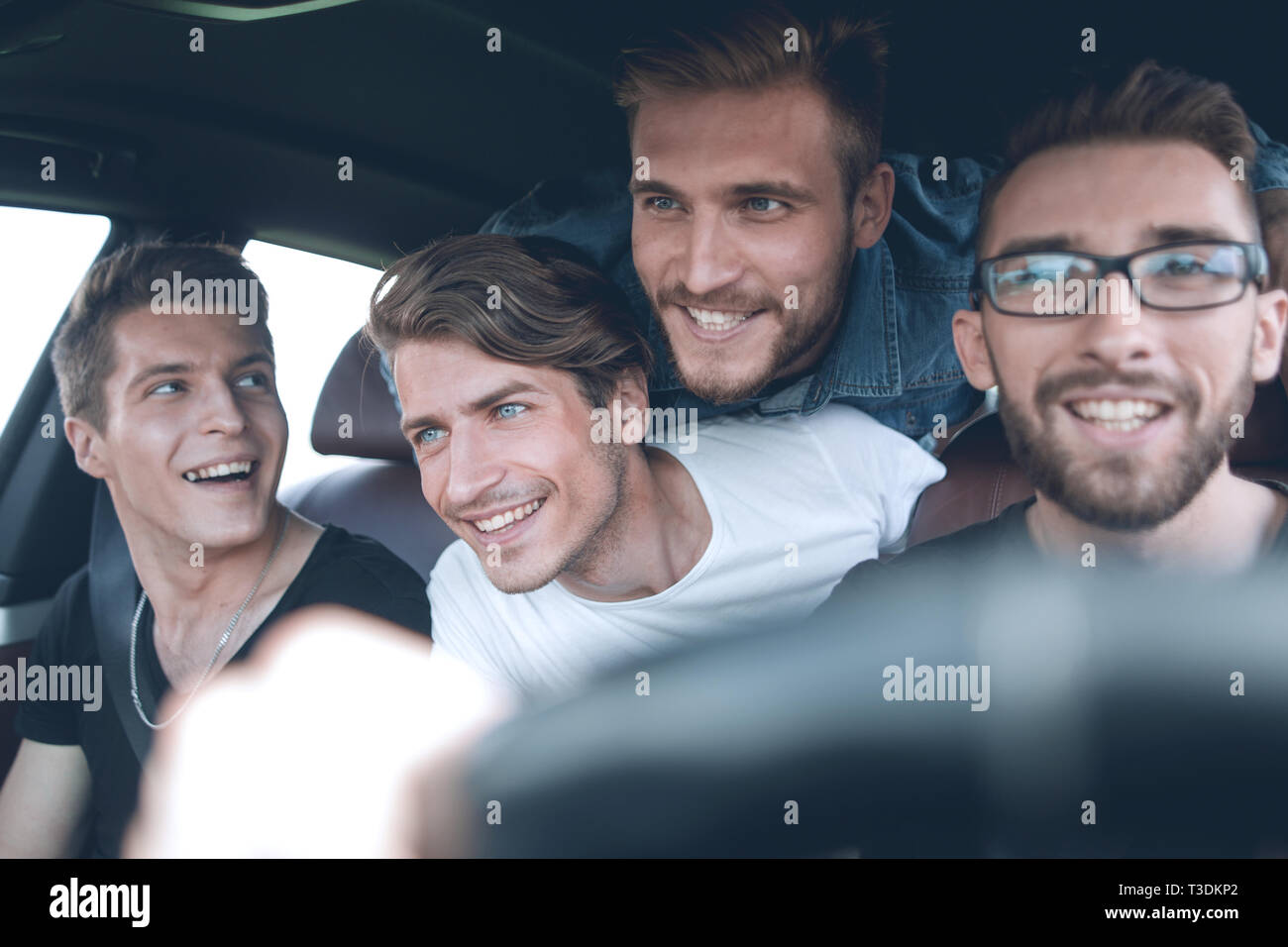 Friends renting a car and driving somewhere Stock Photo - Alamy