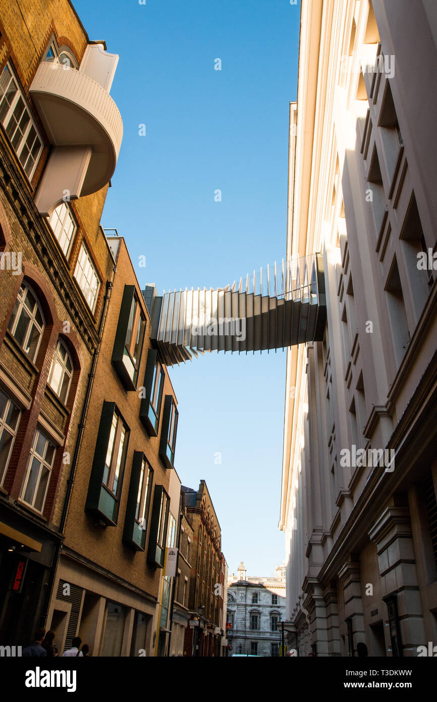 Small footbridge adding buildings central London Stock Photo - Alamy