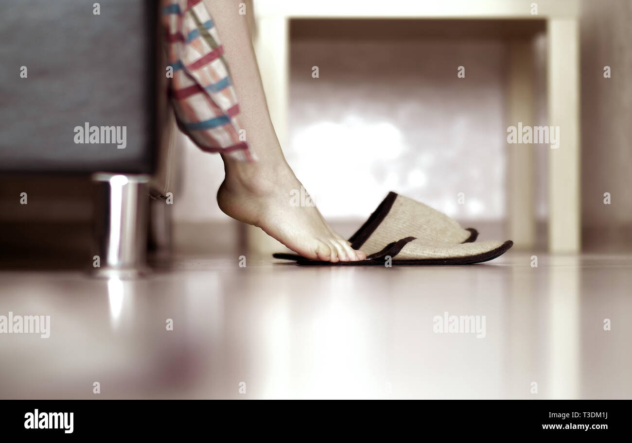 Wearing slippers hi-res stock photography and images - Alamy