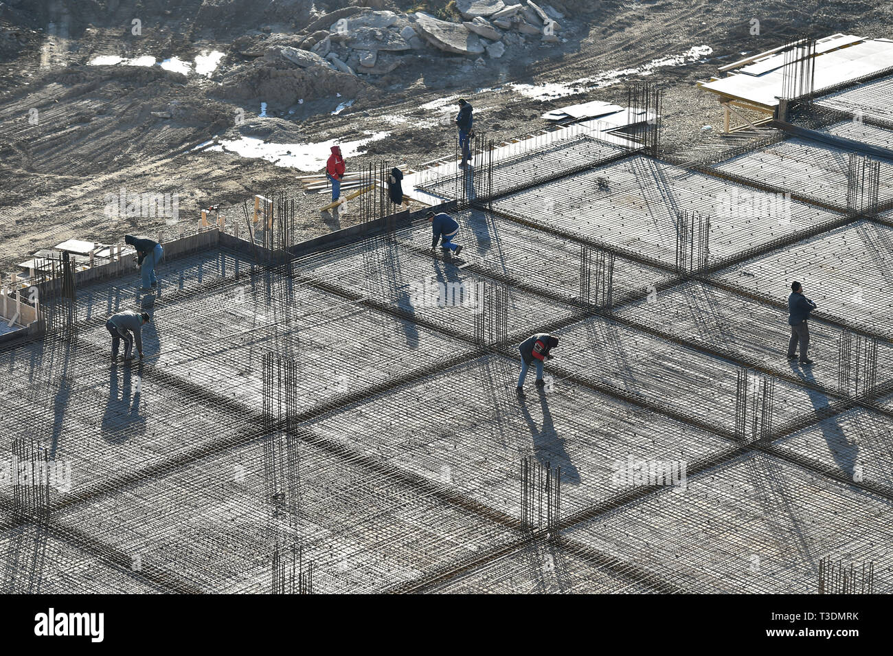 Construction team working on a construction site Stock Photo - Alamy