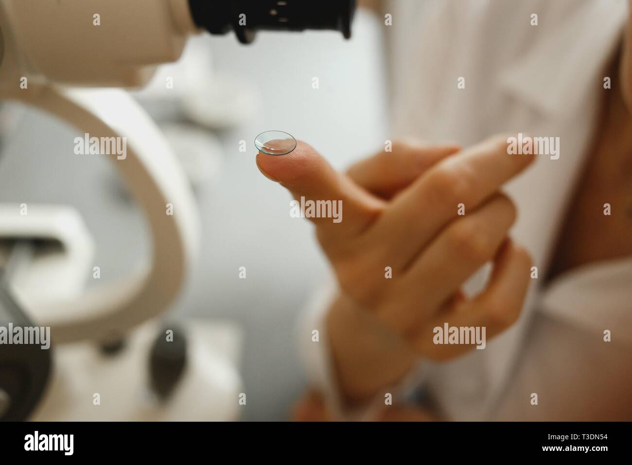 Lenses On Finger High Resolution Stock Photography and Images - Alamy