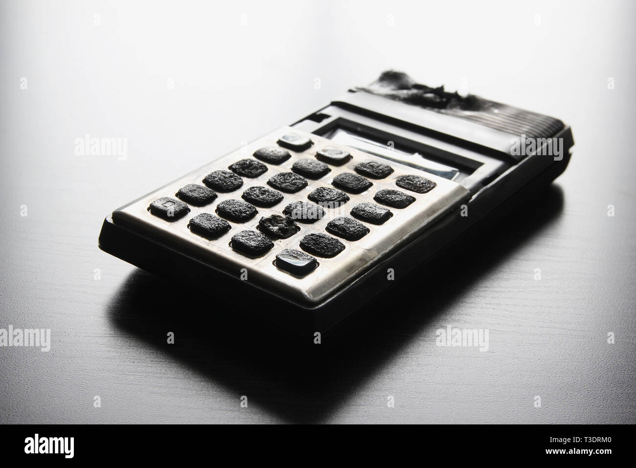 Broken calculator hi-res stock photography and images - Alamy