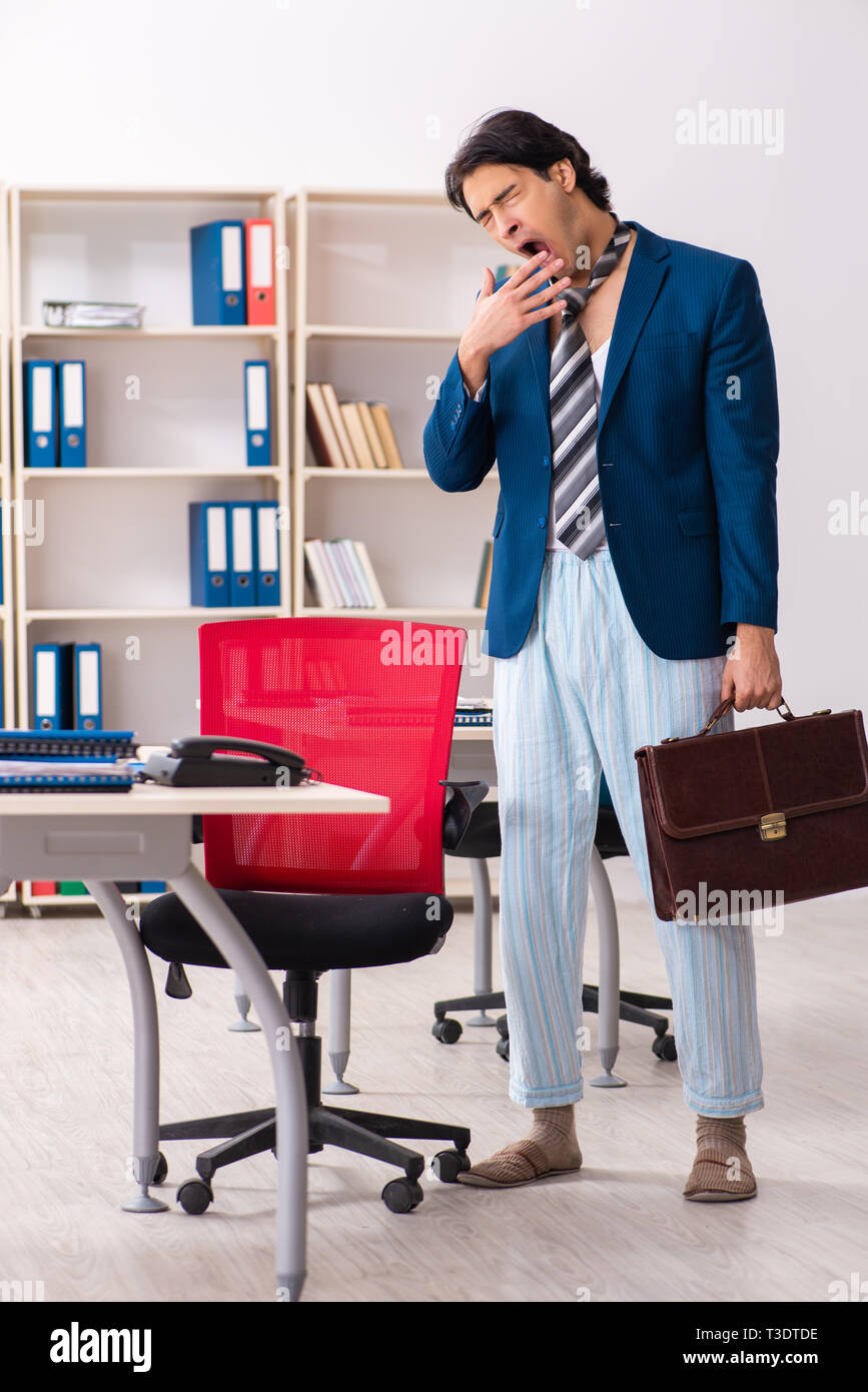 Employee coming to work straight from bed Stock Photo - Alamy