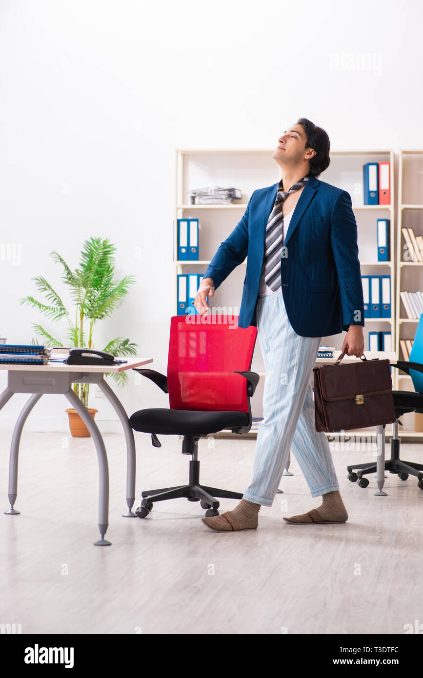 Employee coming to work straight from bed Stock Photo - Alamy