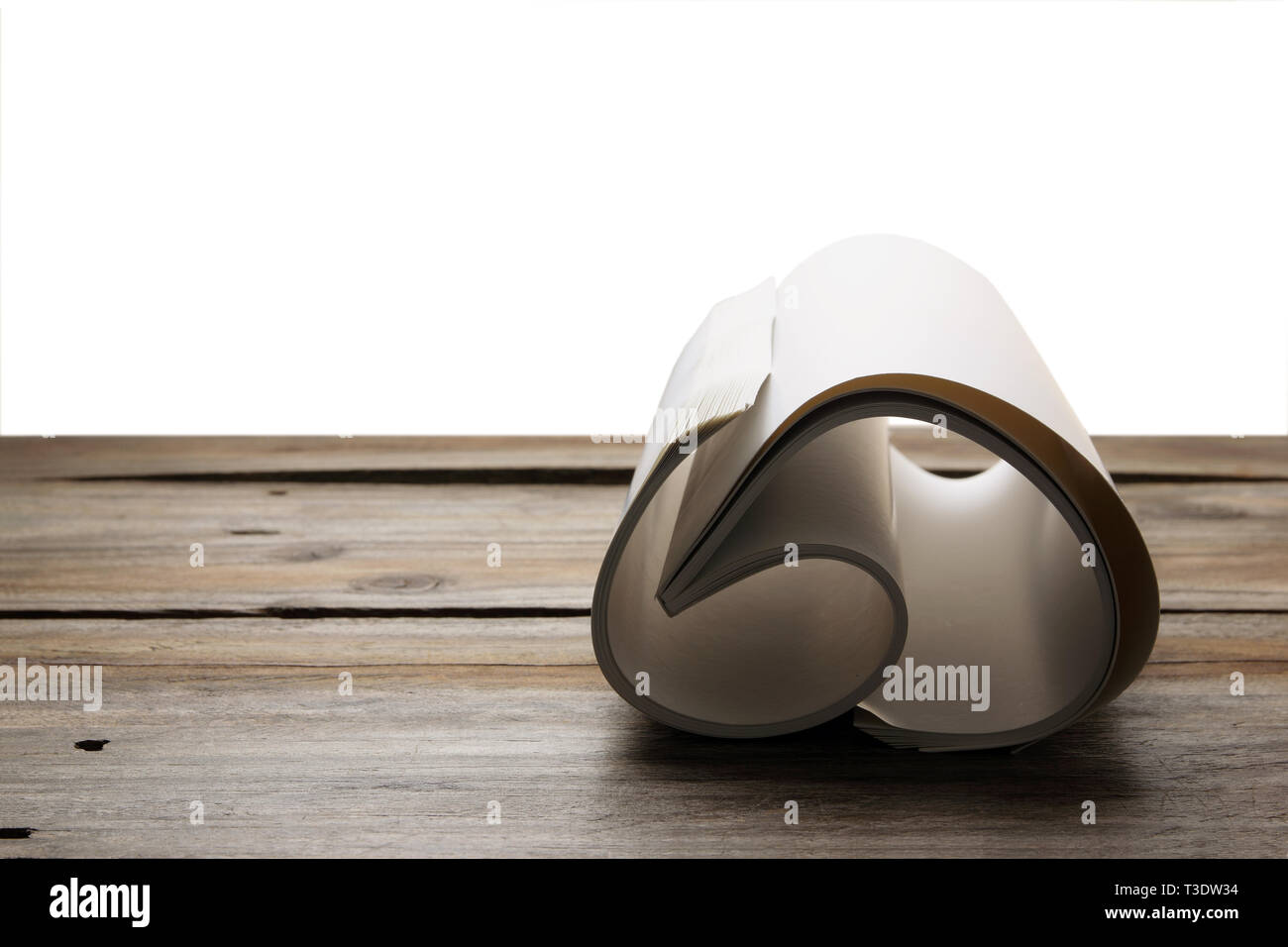 Rolled up curl hi-res stock photography and images - Alamy