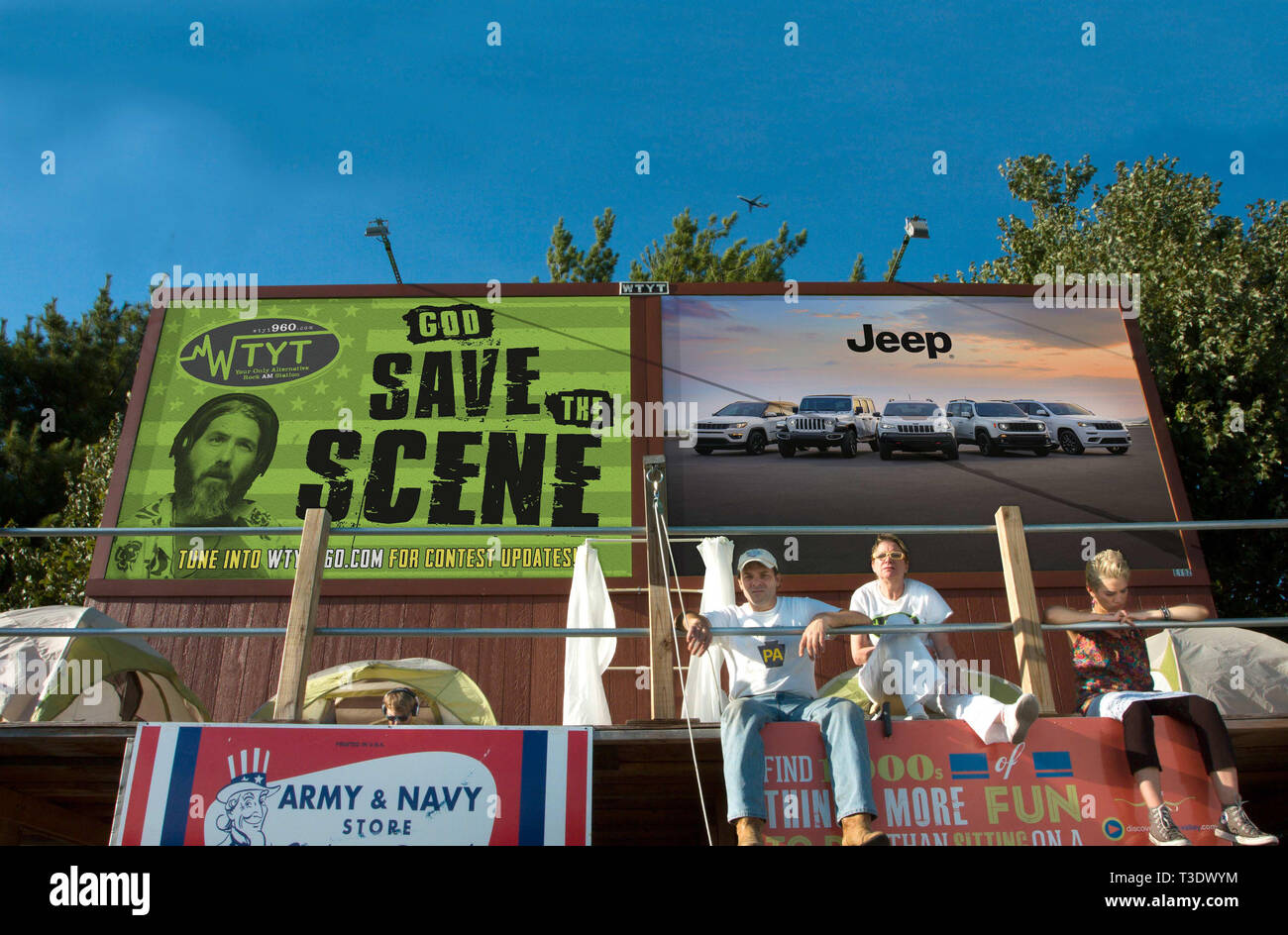 BILLBOARD, from left: Leo Fitzpatrick (on billboard), David Lind (in ...