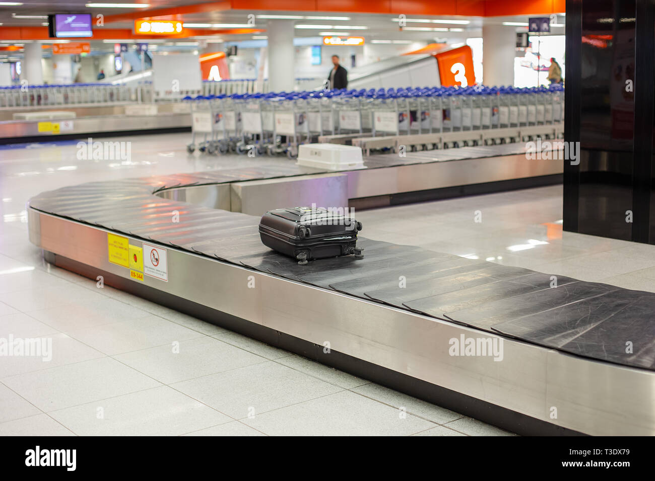 Lost luggage at the airport. Baggage sorting - Luggage on conveyor belt ...