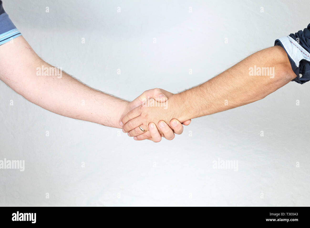 Two Men Handshake at White Background Stock Photo - Alamy